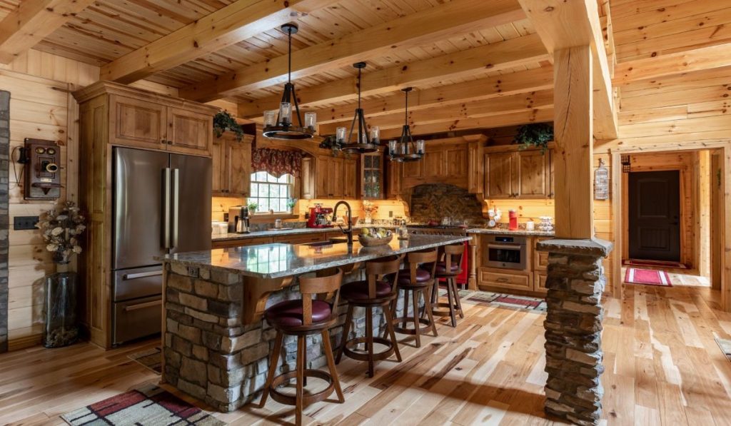 The Boston Mill Log Cabin Has a Stunning Modern Kitchen