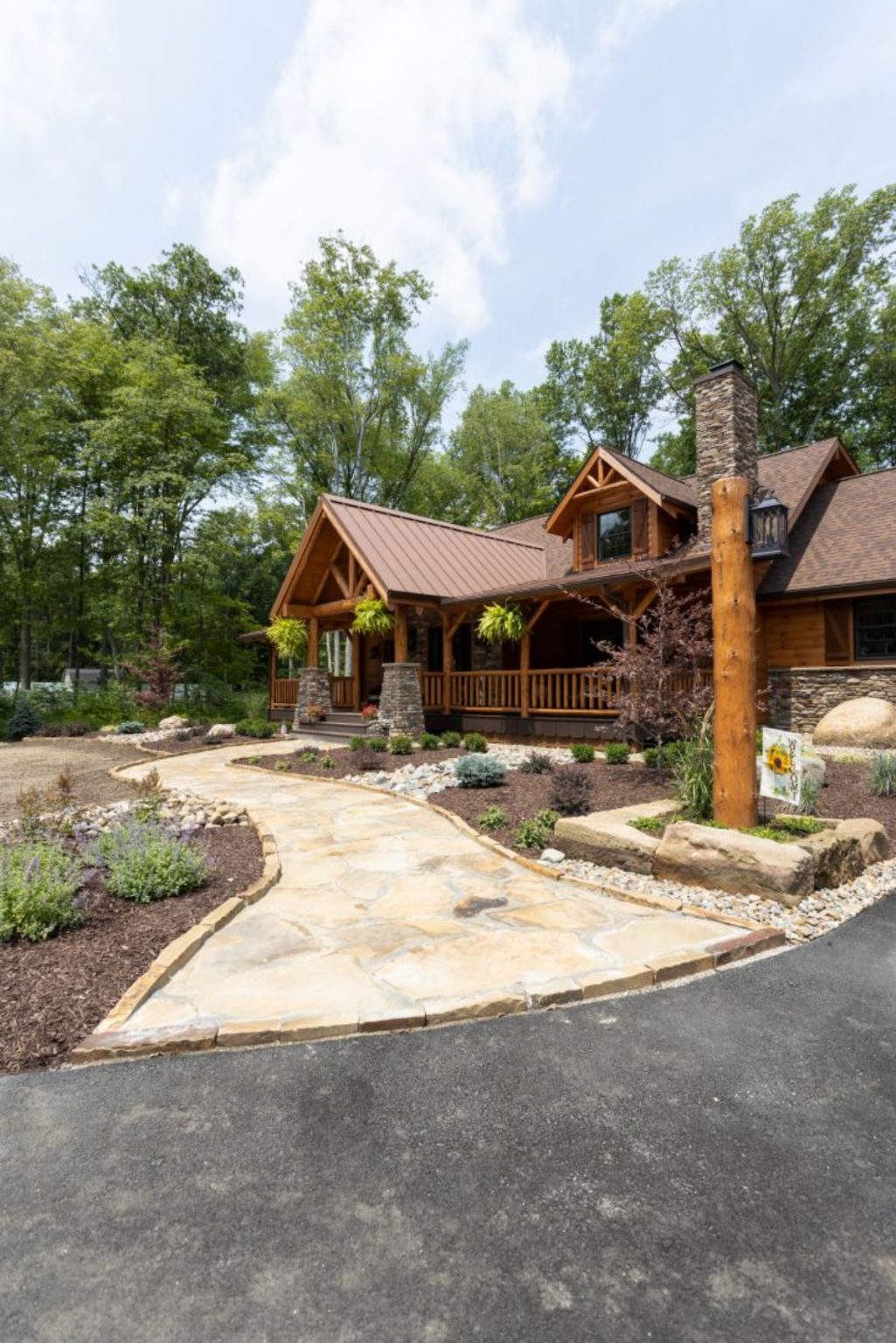 The Boston Mill Log Cabin Has a Stunning Modern Kitchen