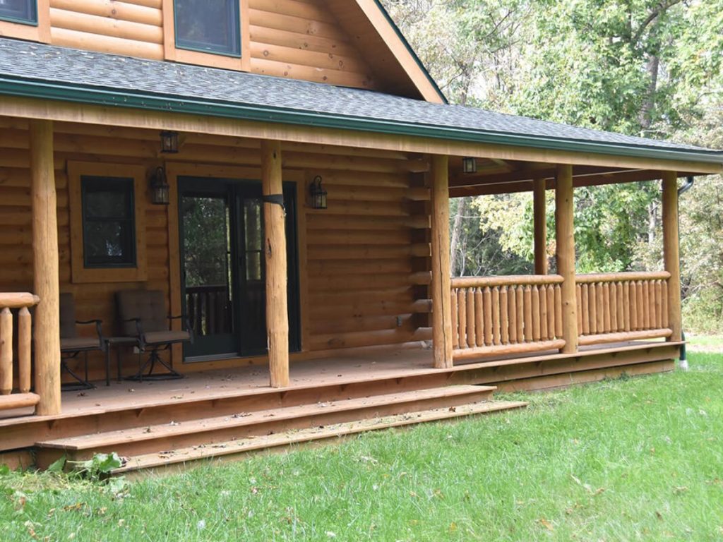 The Chimney Rock Log Cabin Includes a Huge Screened Porch