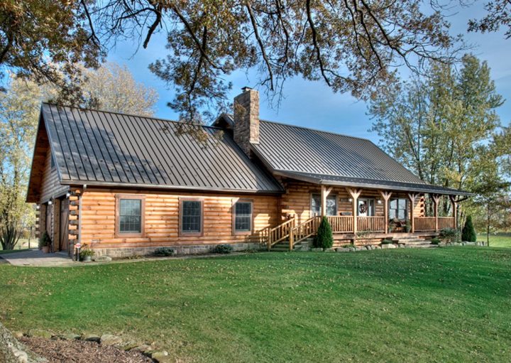 McKay Rustic Log Cabin Has a Barn Style Attached Garage