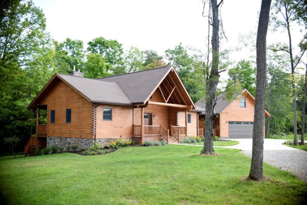 The Slemmer Log Cabin Open Back Deck is Gorgeous