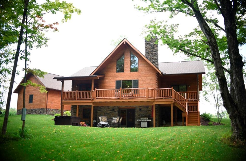 The Slemmer Log Cabin Open Back Deck is Gorgeous