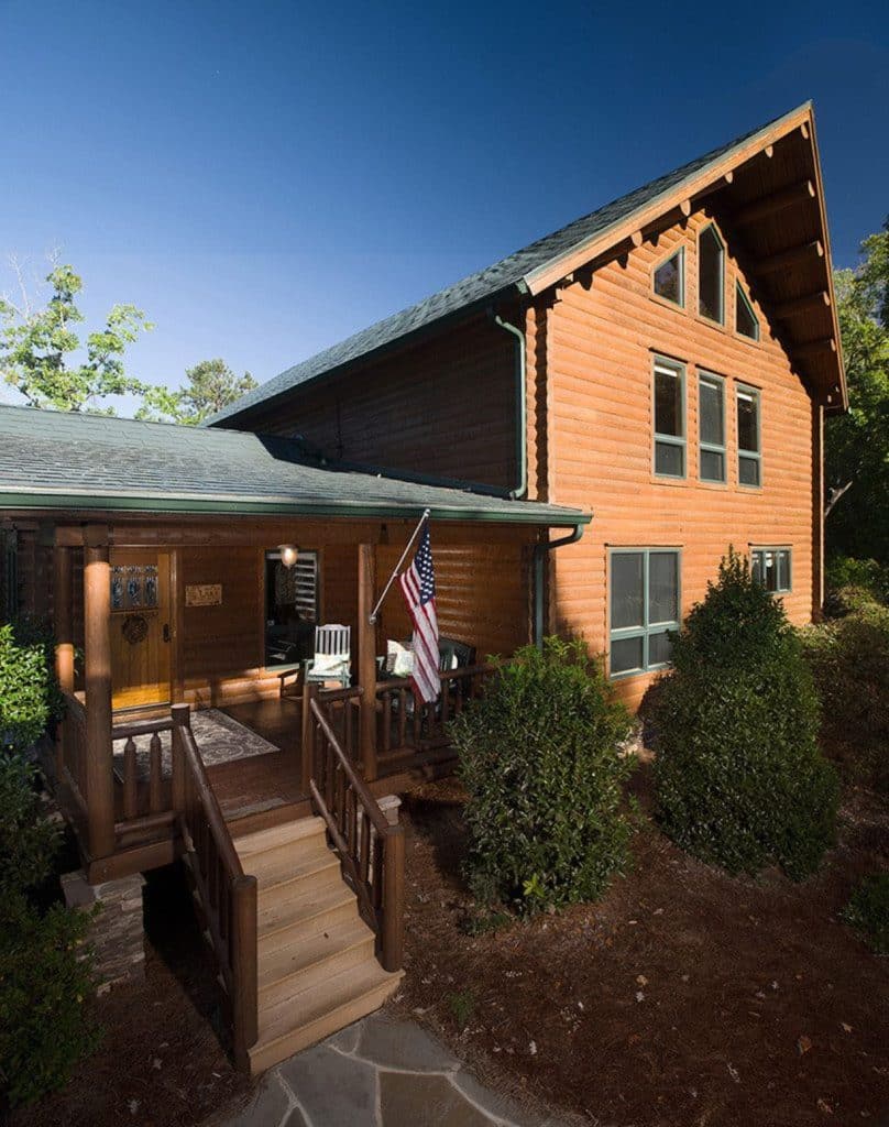 The Multi-Level Bennett Log Cabin Features Elevated Ceilings