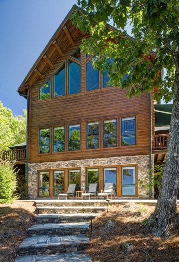 The Multi-Level Bennett Log Cabin Features Elevated Ceilings
