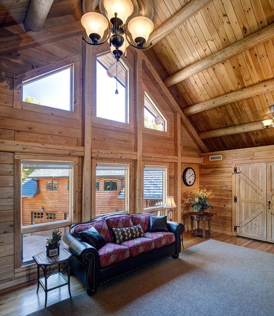 The Multi-Level Bennett Log Cabin Features Elevated Ceilings
